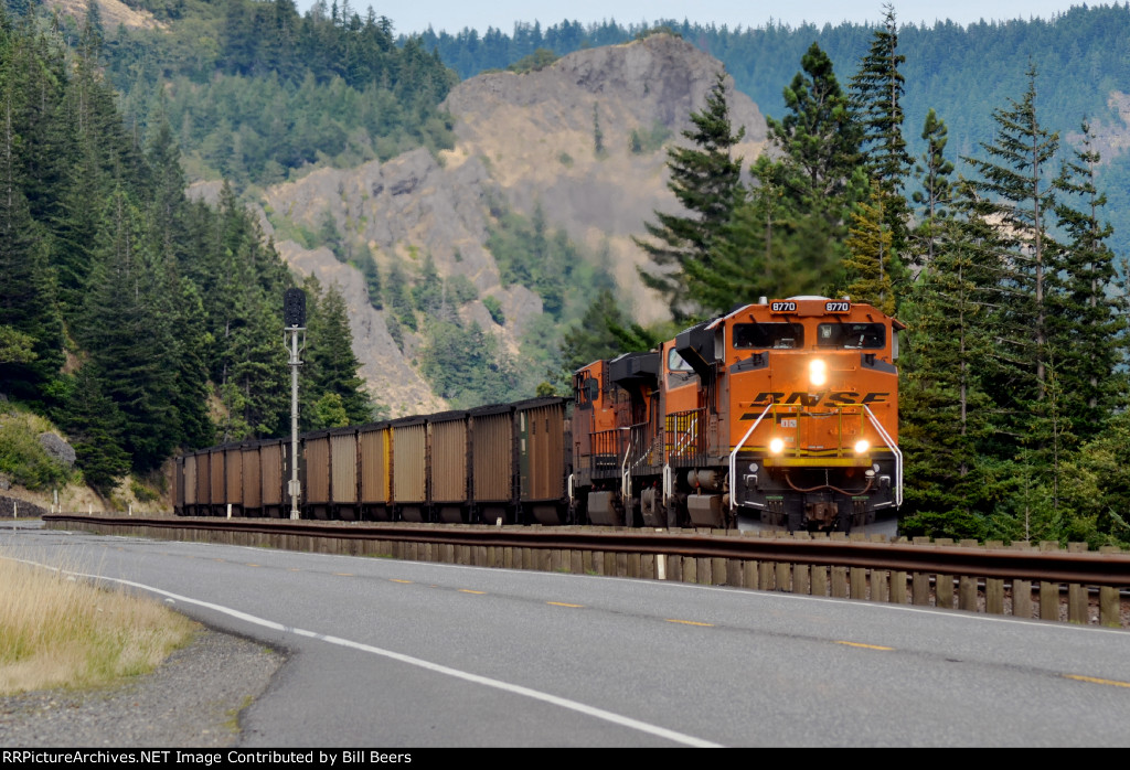 8870 starts pulling a coal train off a siding near North Bonneville